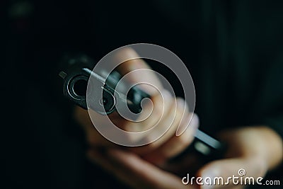 Close Up Of Man Reloading Pistol. Stock Photo | CartoonDealer.com ...