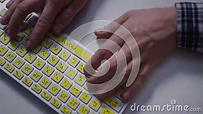 Close-up: a Man Uses a Keyboard with Braille. a Blind Man is Typing ...