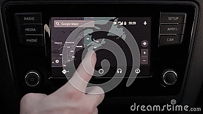 Close Up Mans Hand Using a Map in Skoda Rapid Automobile. Google Maps ...