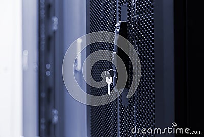 Close Up Meshed Door With Key In Lock. Button In Server Room. Blur ...