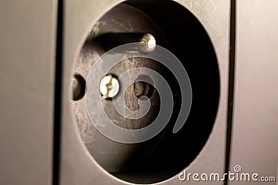 A Close Up Portrait Of A Type E Wall Socket Used To Supply Electric Or ...