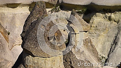 A Small Group of Erect-topped Cone-shaped Rock Formations Stock Footage ...