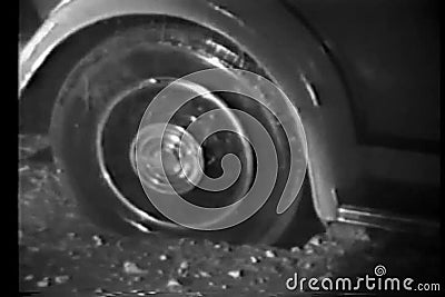 Close-up of Spinning Car Tire Stuck in Mud Stock Footage - Video of ...