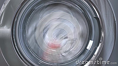 Close Up Timelapse of Washing Machine Spinning Fast Left and Right with ...
