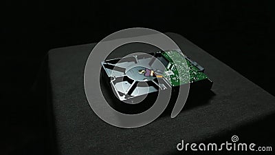 Closeup of HDD Underside in Dark Room on Gray Textile Surface. Hard ...
