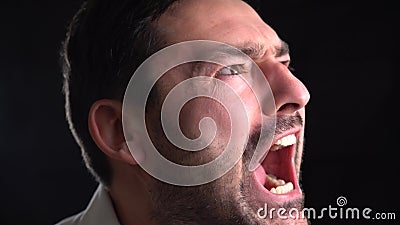 Closeup Portrait of a Young Man Screaming Out Loud Stock Footage ...