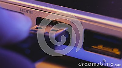 Closeup of USB Flash Drive Inserted into Port on the Side of a L Stock ...