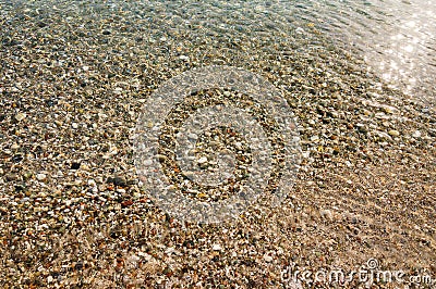 The Coastal Shingle Of The Seabed In Clear Water Royalty-Free Stock ...