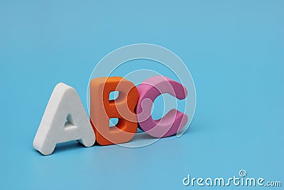 THE Color Letters Of The ABC Are Isolated On A Blue Background. English ...