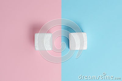 Two Objects Arranged Facing Inward Outward On A Separated Coloured ...