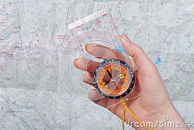 Compas, Map And Hand Royalty-Free Stock Photo | CartoonDealer.com #28269303
