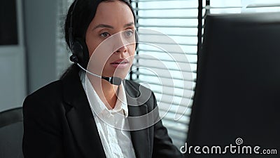 Competent Female Operator Working on Computer and while Talking with ...