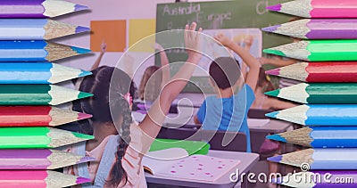 Composite Video of Colored Pencils Against Group of Students Raising ...