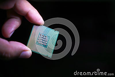 Computer CPUs In The Hands Of Men On A Black Background Royalty-Free ...