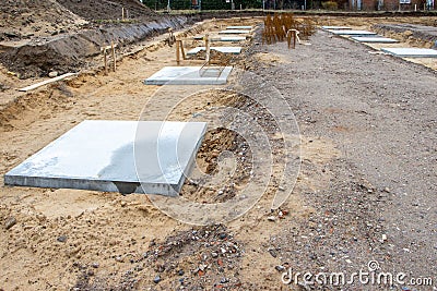Concrete Foundations For The Columns Of A Factory Building Are Poured ...