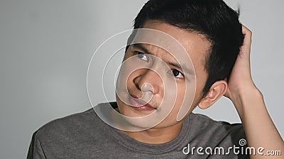 A Confused Asian Man Closeup Isolated Stock Footage - Video of confused ...