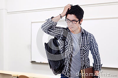 Confused Male Learner Standing In Class Royalty-Free Stock Photography ...