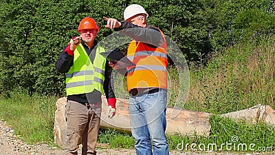 Construction Engineer Explains To Worker Assigned Work Stock Video ...