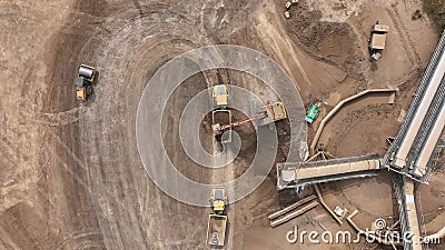 Construction Tipper Trucks Being Loaded Up with Earth by a Digger Stock ...
