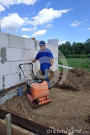 Construction Work On The Construction Site, Soil Compaction With A ...