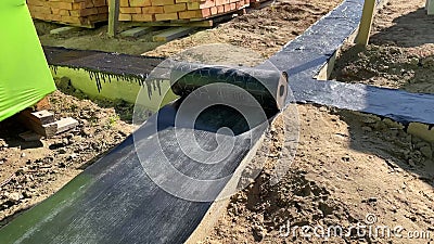 Construction Work on Waterproofing the Foundation. Roll Waterproofing ...