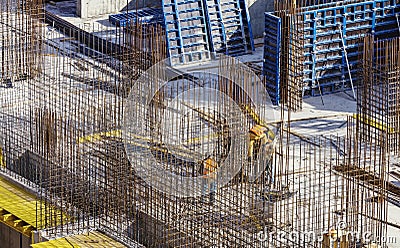 Construction Workers Install Formwork And Iron Rebars Or Reinforcing ...