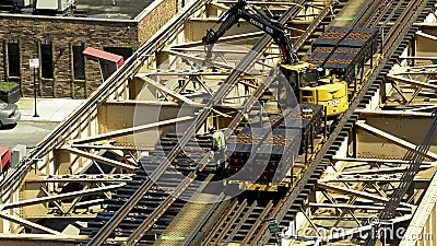 Construction Workers Perform Maintenance and Repair on Public Transit ...