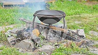Cooking in a Cauldron Over the Fire of Bonfire Stock Video - Video of ...