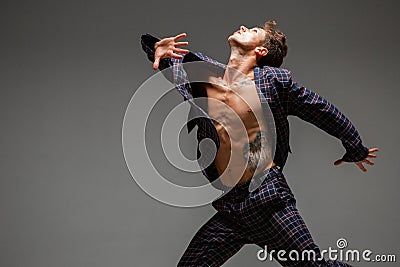 Cool Young Guy Dancer In Suit Dancing Modern Expressive Dance In Studio ...