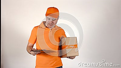 Courier In Orange Uniform Delivering A Parcel. Light Grey Backround, 4K ...