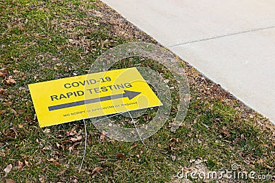 COVID-19 Pandemic Rapid Testing Site Sign Laying On The Ground Stock ...