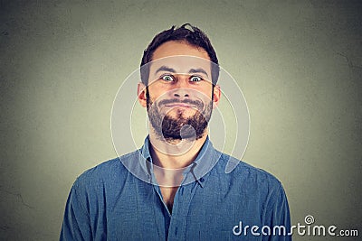 Crazy Looking Man Making Funny Faces Stock Photo | CartoonDealer.com ...