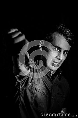 Crazy Young Man With A Gun Stock Photo - Image: 60303382
