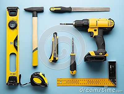 Creative Provocation: A Flat Layout Of Yellow Hand Tools On A Blue ...
