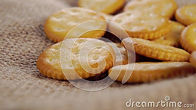 Crispy Crackers. Thin Round Cookies on a Rustic Rough Burlap Stock ...
