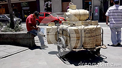 LPG Gas Cylinder Delivery Boy is Delivering Gas Cylinder during Corona ...