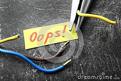 Cut Wires And Piece Of Paper With Text OOPS On Grey Background. Mistake Concept Royalty-Free ...