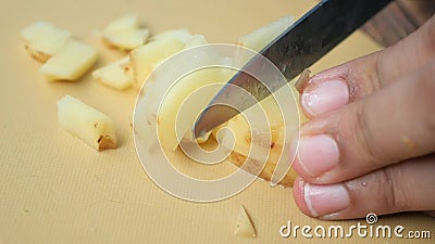 Cutting Slice of Raw Potato on a Chopping Board Stock Footage - Video ...