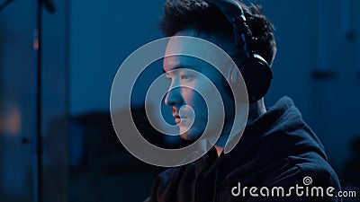 Hacker in Headphones Using Computer at Nigt Stock Footage - Video of ...