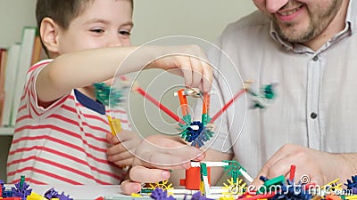 Dad and Son Build Figures from the Constructor. Spending Time Together ...