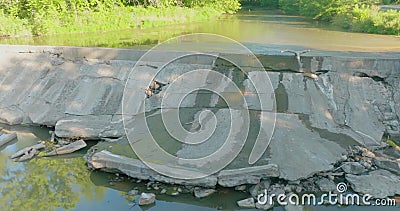 A Dam that Has Broken Concrete. Water is Flowing Stock Footage - Video ...