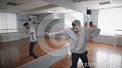 Dancer is Dancing Near the Mirror. Light Dance Class with a Window ...