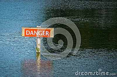 Danger Hazard Warning Sign In River Stock Photo - Image: 58352357