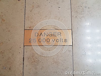 Danger 25000 Volts Warning Sign On Tile Floor Royalty-Free Stock Photo ...