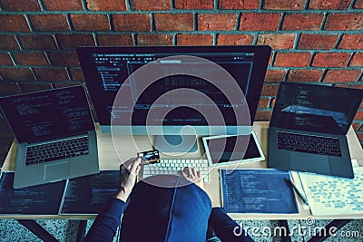 Dangerous Hooded Hacker Using Credit Card Typing Bad Data Into Computer ...