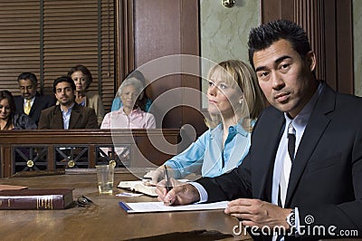 Defense Lawyer With Client In Court Stock Image - Image: 29662901