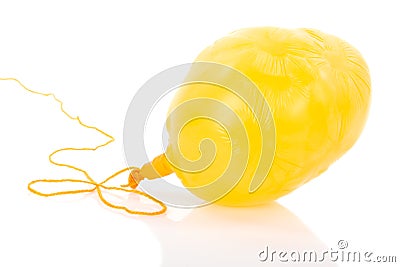 Deflated Yellow Balloon At A Rope Stock Photo | CartoonDealer.com #29015532