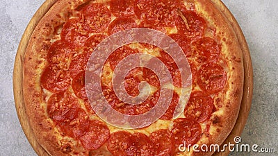Delicious Pepperoni Pizza Spinning on the Table Stock Video - Video of ...