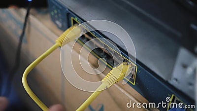 Detail of Network Cable Being Plugged into Networking Switchboard Stock ...