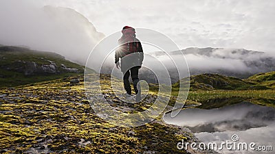 Difficult Climbing Male Explorer in the Misty Mountains. No View from ...